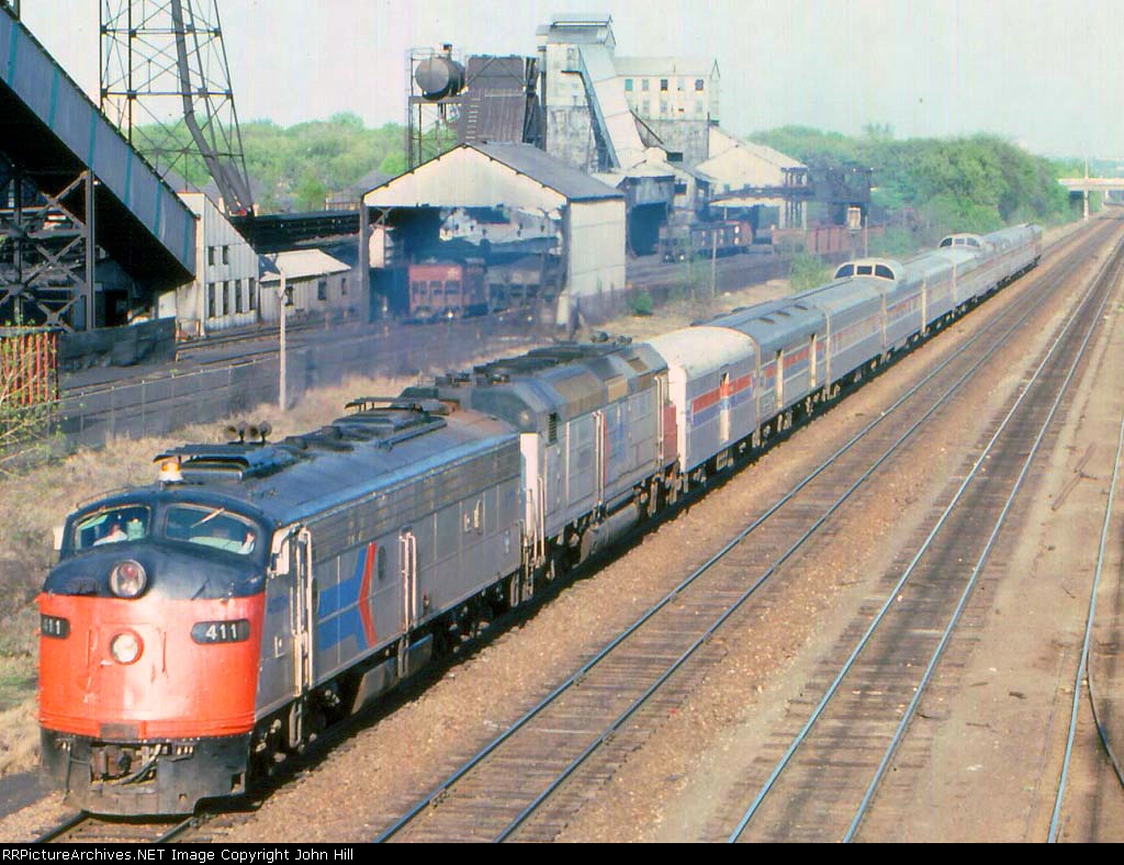 1007-30a Westbound Amtrak North Coast Hiawatha passing Kopper Coke